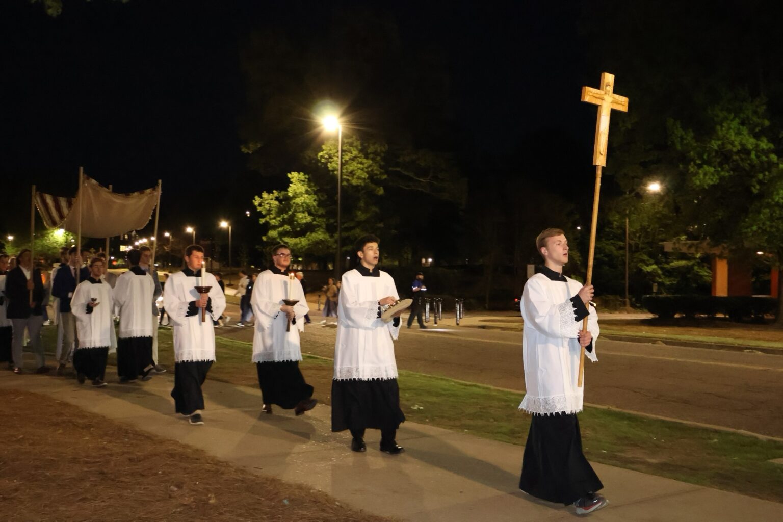 Cowbell Catholic leads Eucharistic Procession across University campus ...